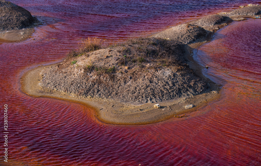 Polluted red lake Stock Photo | Adobe Stock