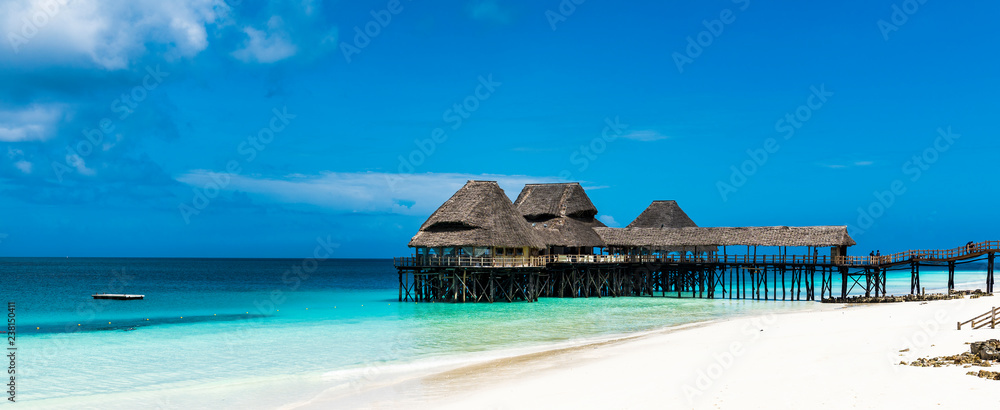 Beautiful Beach by the blue waters of the Indian ocean in Zanzibar ...
