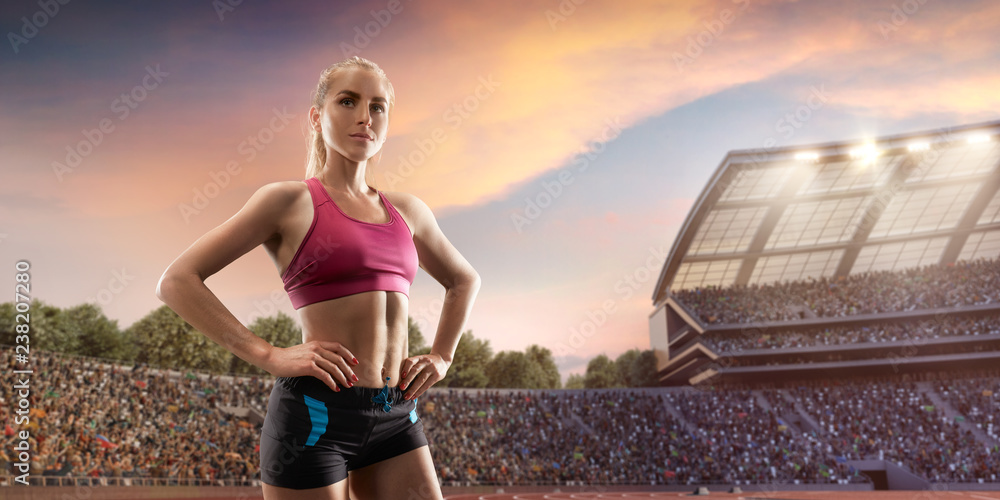 Beautiful female athlete. Woman sprinter in sport clothes at the ...
