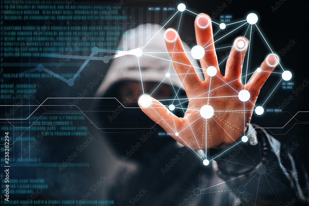 Stockfoto med beskrivningen Cyber crime. Male hacker accessing to personal information. Hooded ...