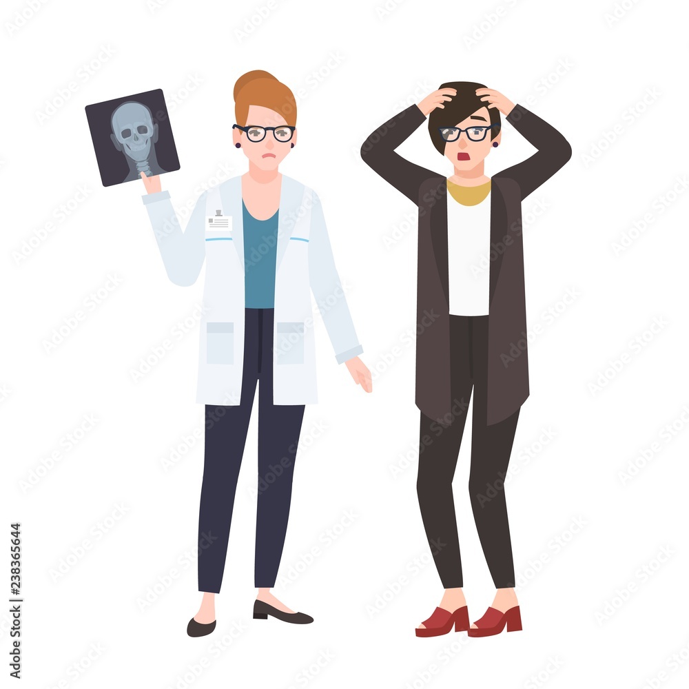 Angry female doctor or surgeon demonstrating X-ray to scared patient ...
