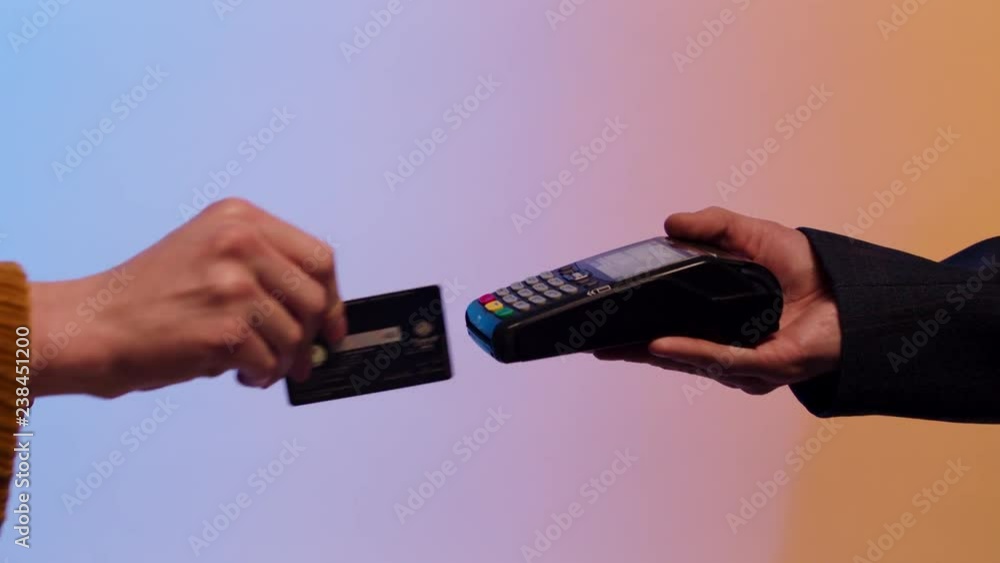 Payment with magnetic stripe credit card through the terminal, isolated ...