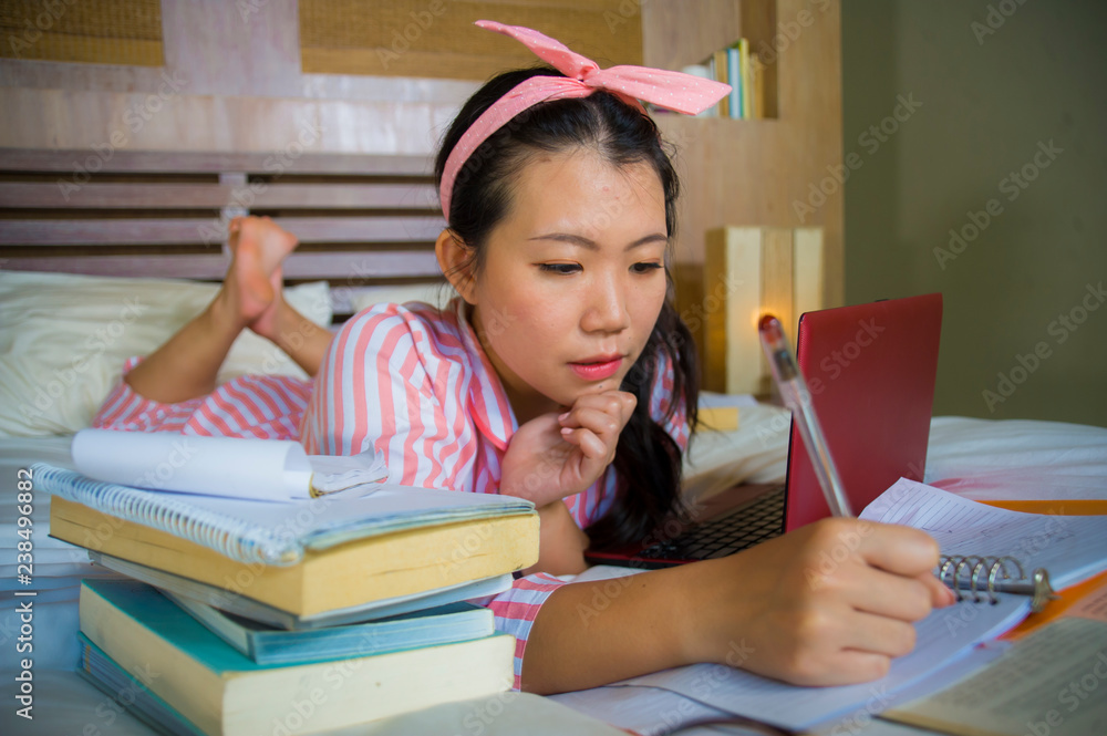 young confident and beautiful Asian Korean student girl preparing ...