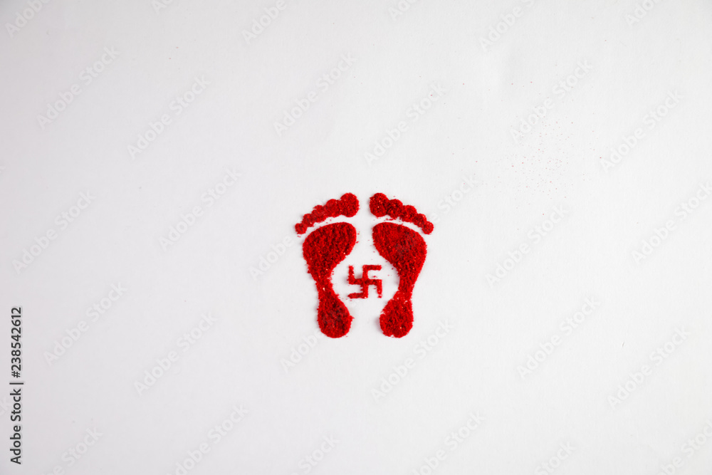 Maa Lakshmi footprint made by red rangoli Stock Photo | Adobe Stock