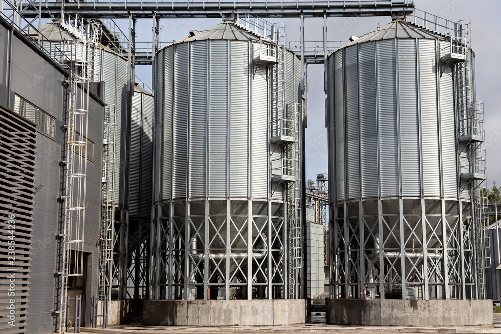 Exterior of Agricultural Silo building with storage tanks for ...