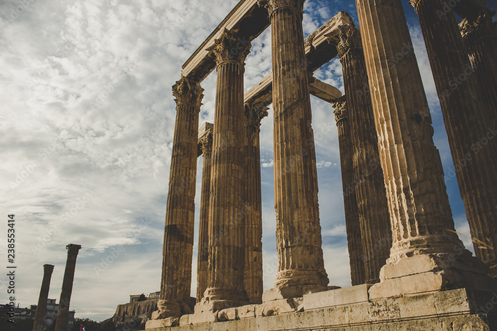 column ancient antique temple ruins foreshortening from below on sky ...
