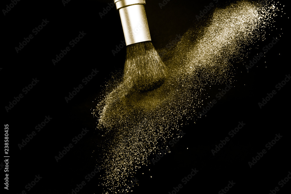 gold powder splash and brush for makeup artist or beauty blogger in ...