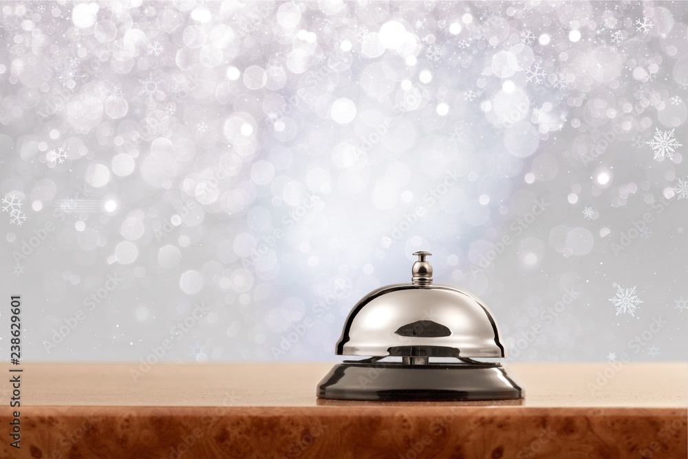 Vintage hotel reception service desk bell on blurred background Stock ...