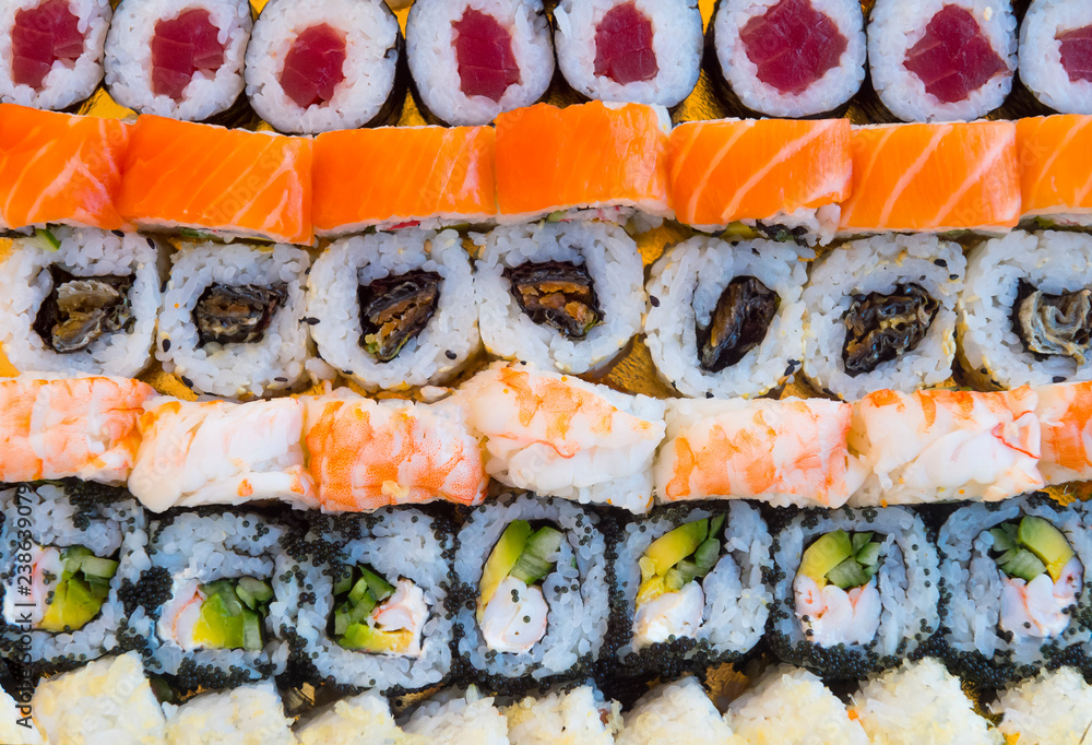 Overhead japanese sushi food. Maki ands rolls with tuna, salmon, shrimp ...