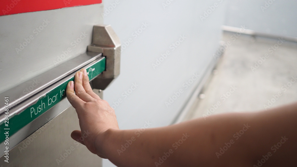 Fire door handle of Fire exit for emergency evacuation. Stock Photo ...