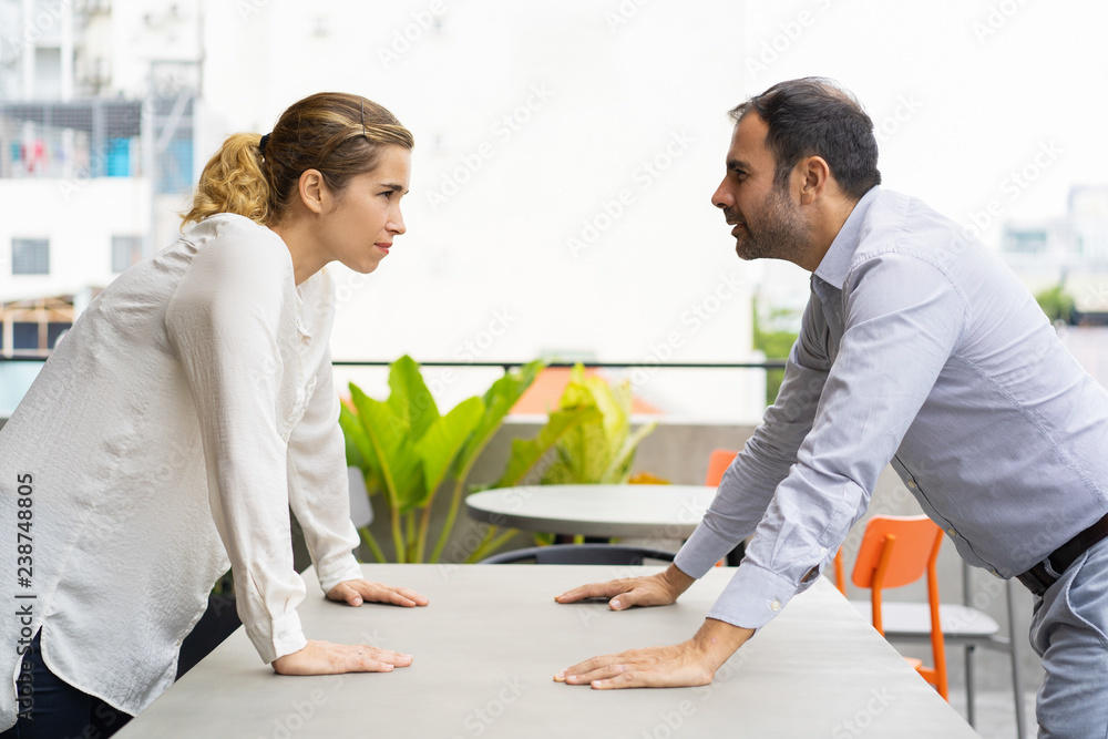 Angry business opponents arguing with each other. Business man and ...