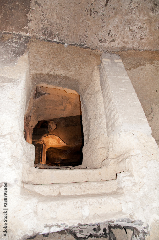 Photo & Art Print Ancient tombs dug in the tuff rock in the subsoil of ...