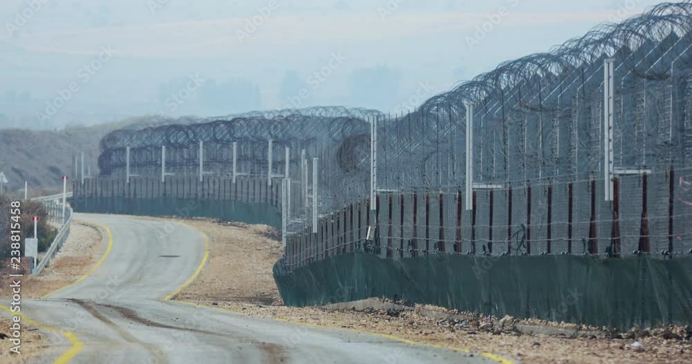 Border of Syria and Israel. Tall fences with military posts and UN ...