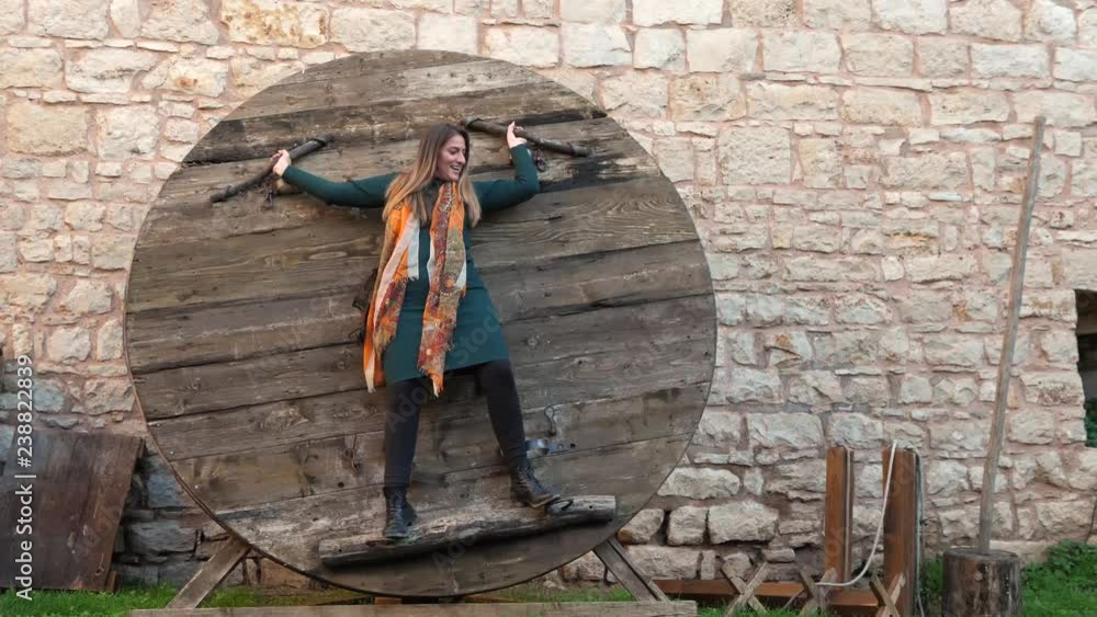 Close up slow motion footage of woman on medieval torture device Stock ...