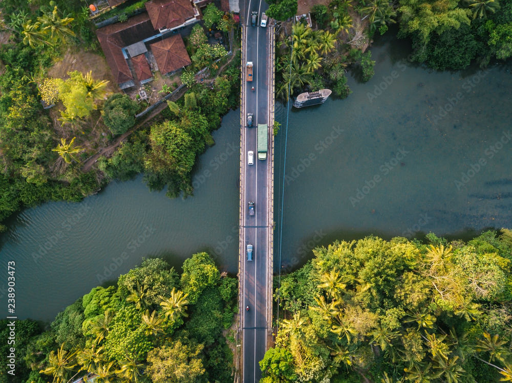 Indonesia, Bali, Balian, Bridge and tropical river Stock-Foto | Adobe Stock