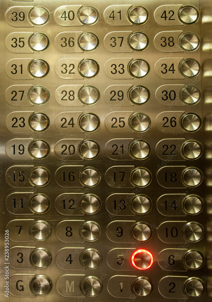 many elevator floor buttons in a building Stock Photo | Adobe Stock