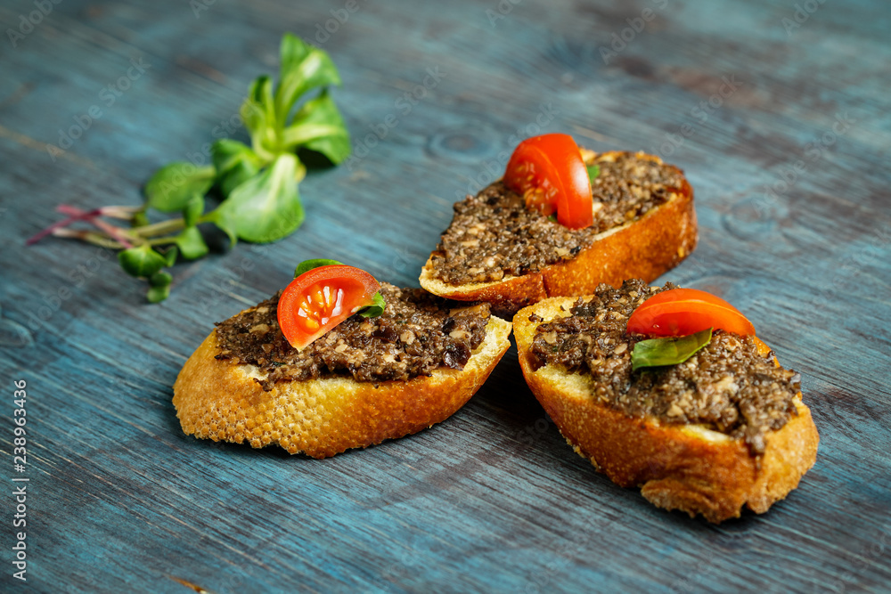 Tapenade on bread Stock Photo | Adobe Stock