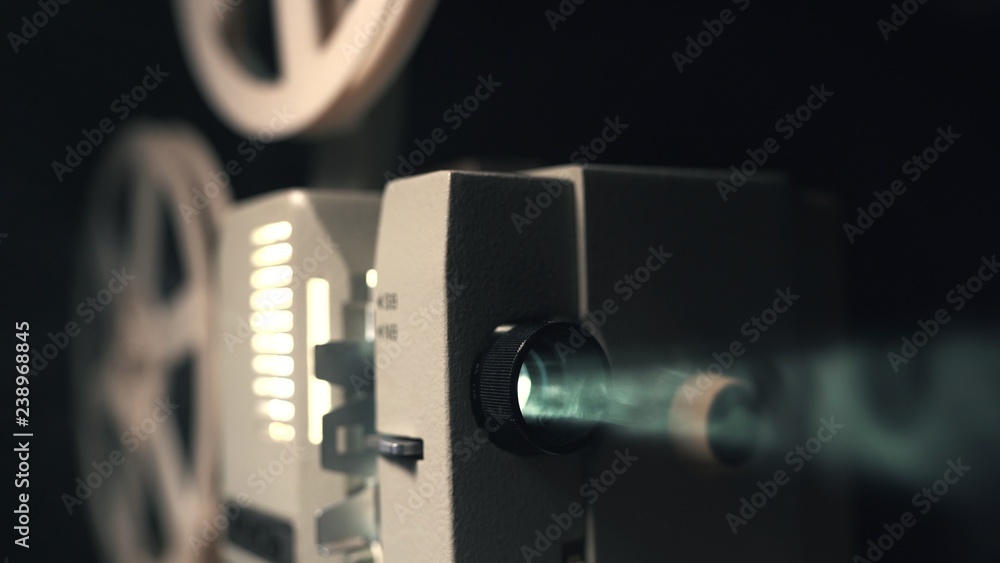 Front view of an old-fashioned antique Super 8mm film projector ...