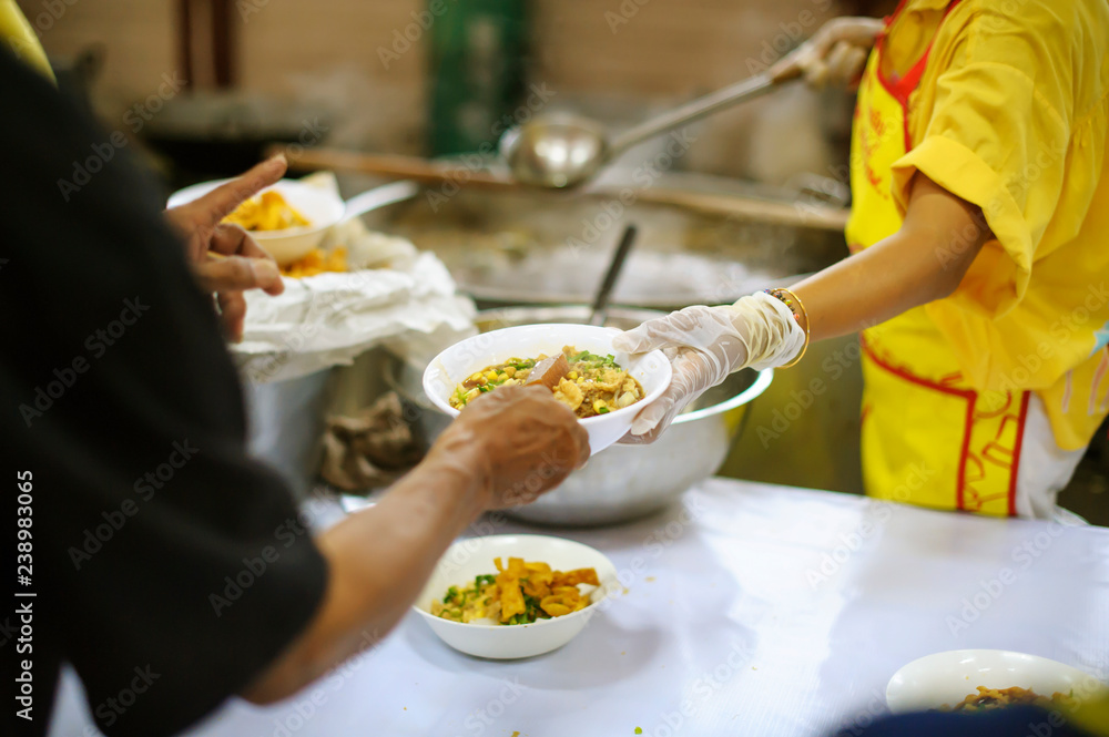 Donating food to beggars to alleviate hunger : the concept of sharing ...