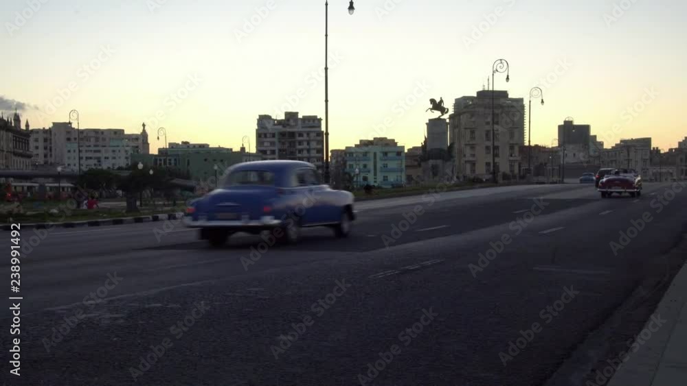 iconic classic 1950's American vintage convertible car driving on ...