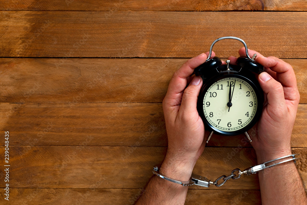 Concept time locked in jail for serving a crime. Stock Photo | Adobe Stock