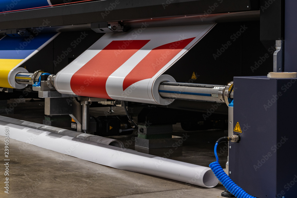 Very big printer during color sample phase, massive vinyl rolls ...