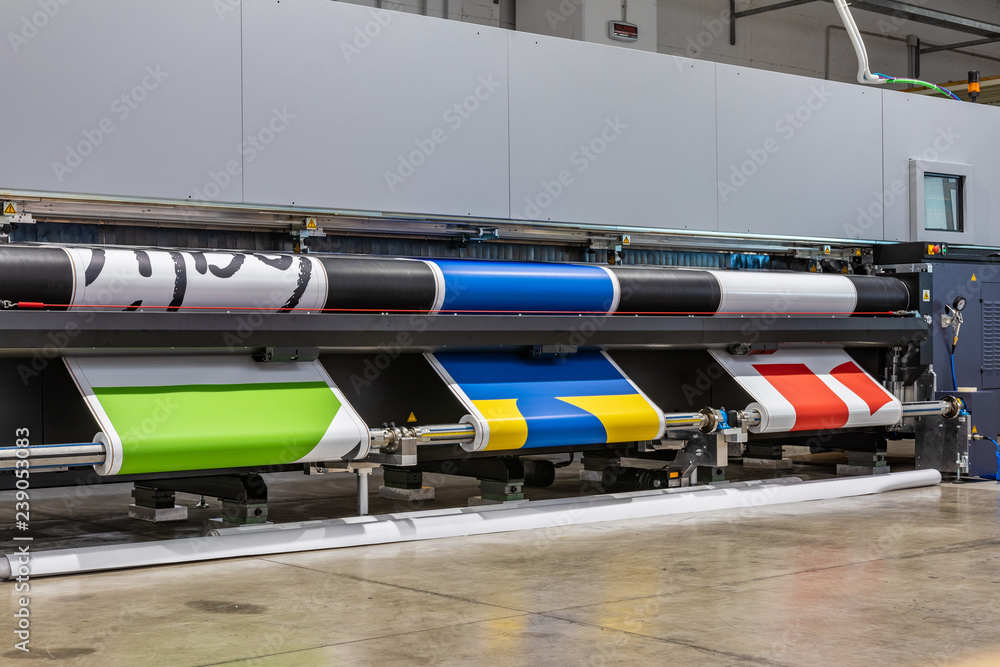 Very big printer during color sample phase, massive vinyl rolls ...