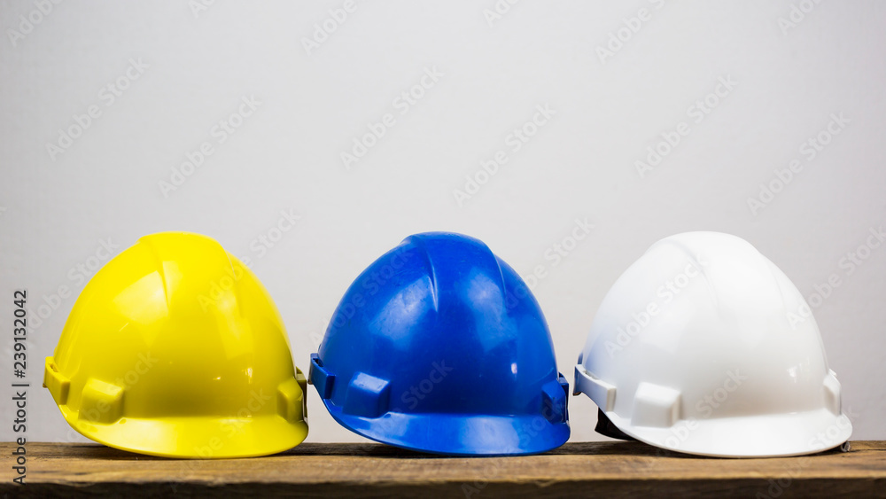 Works safety concept: PPE (Personal Protective Equipment), hard hat or ...