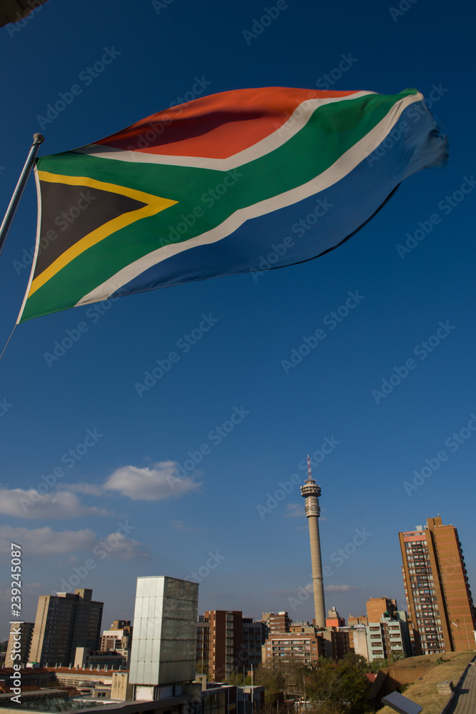 South African flag in Johannesburg, South Africa Stock Photo | Adobe Stock