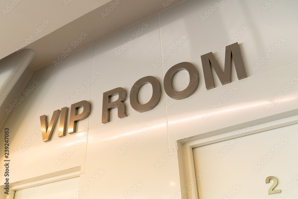 Gold VIP room sign in front of the room with warm light effect for ...