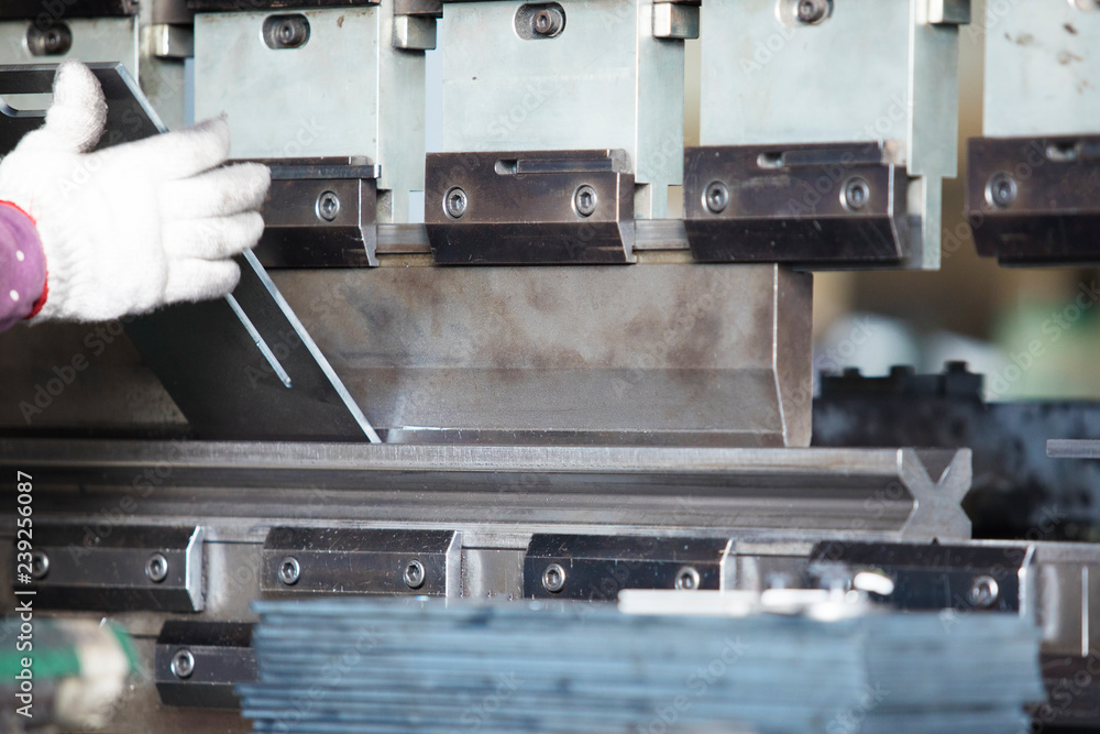 Sheet metal bending ,Operator working cut and bending metal sheet Stock ...