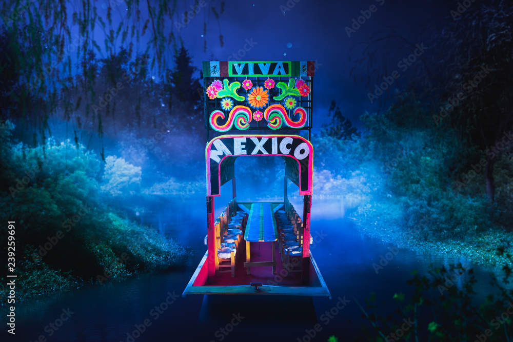 scale model replica of a mexican trajinera on the water Stock Photo ...