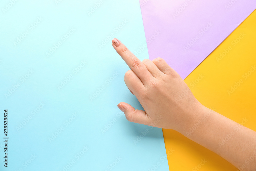 Female hand showing middle finger on colorful background Stock Photo ...