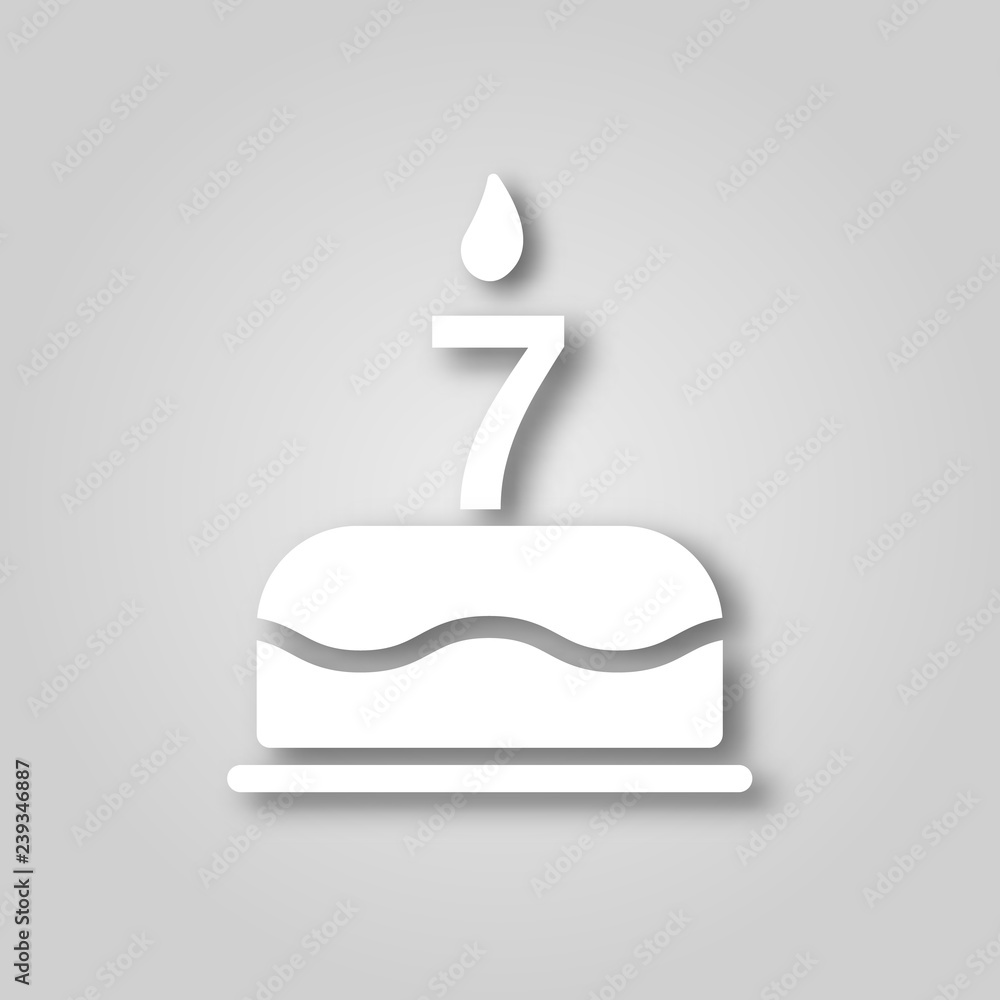 Birthday cake with candles in the form of the number 7 figure cut out ...