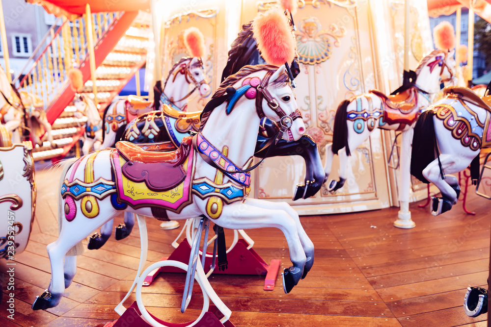 Old French carousel in a holiday park. Merry-go-round with horses Stock ...