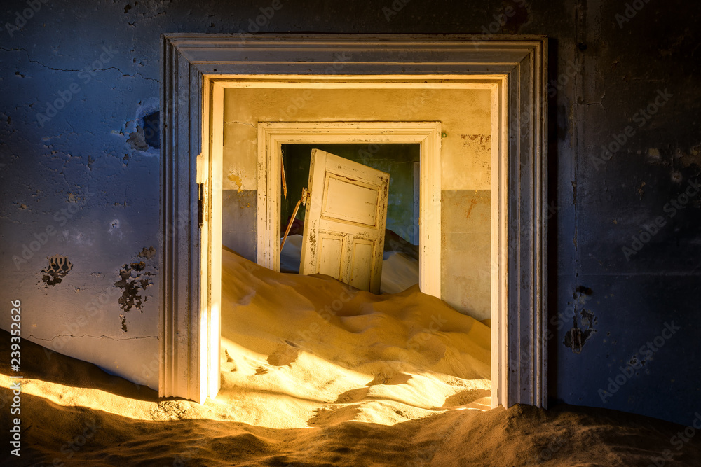 Building taken over by sand, former diamond mining town, now ghost town ...