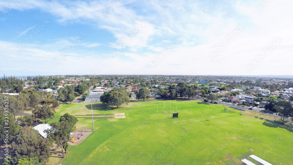 Drone aerial view of Australian public park and sports oval field ...