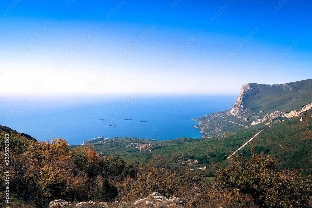 Scenery of South Coast of Crimea, endless Black Sea and rocky cliffs ...