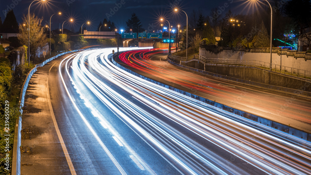 Long exposure at night, foggy view with lights and glitters of Cassiar ...