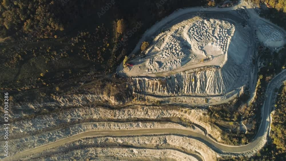 Top view of stepped quarry. Shot. Quarry working by method of open ...