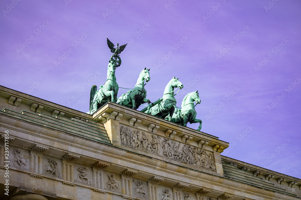 Brandenburg Gate In Berlin. Historic symbol in Germany. Cloudy sky ...
