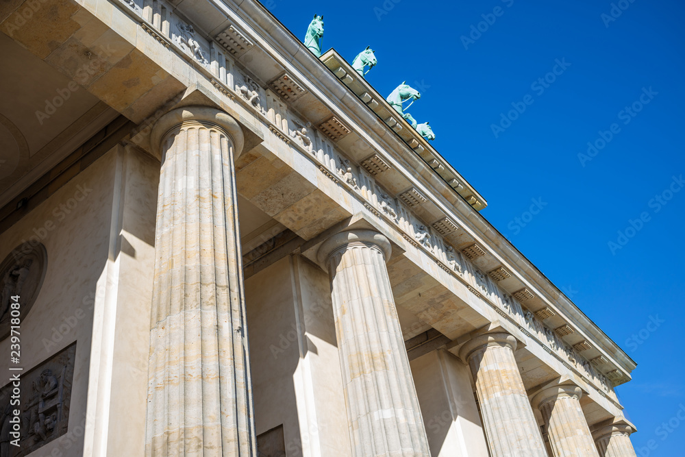 Brandenburg Gate In Berlin. Historic symbol in Germany. Clear blue sky ...