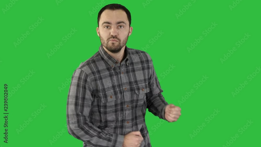 Casual man walking and dancing on a Green Screen, Chroma Key. Stock ビデオ ...