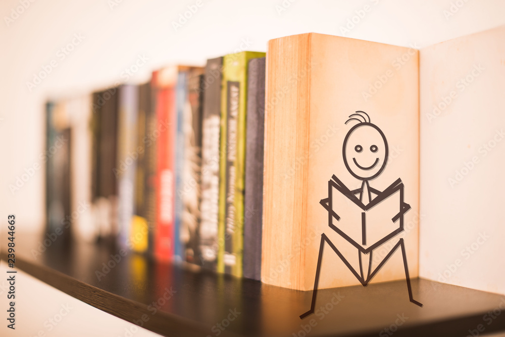 Books on a wooden bookshelf with a stick figure on an open book sitting ...