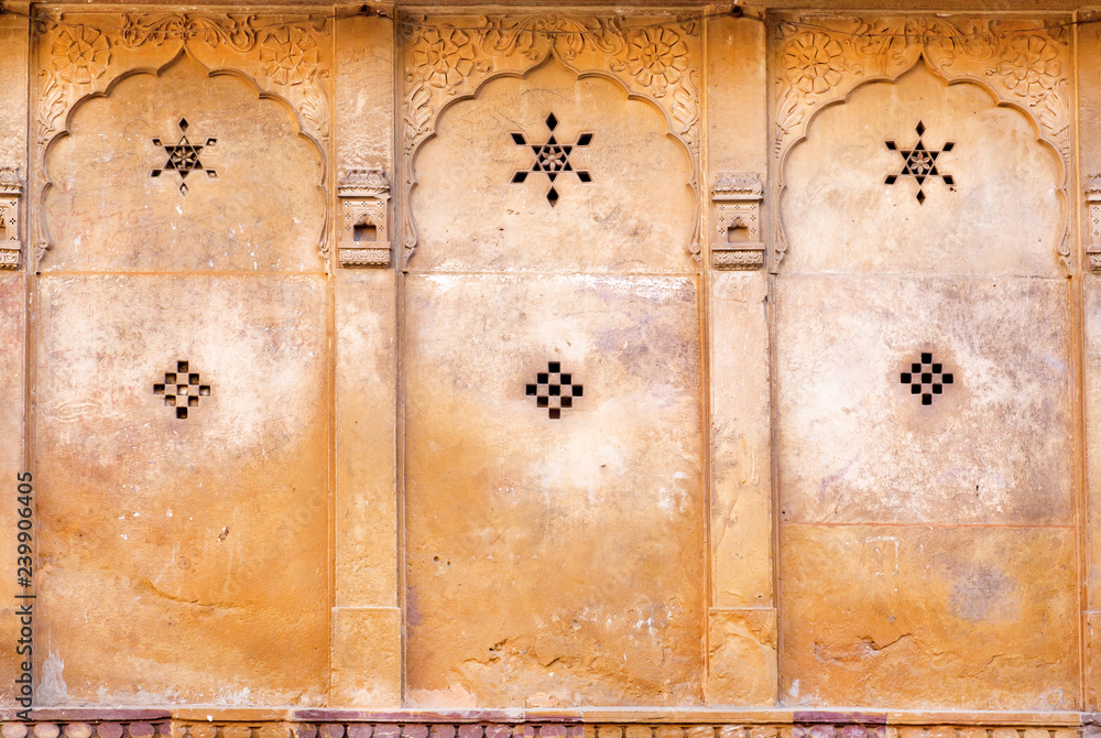 Patterns with stars on wall of historical house in Rajasthan, India ...