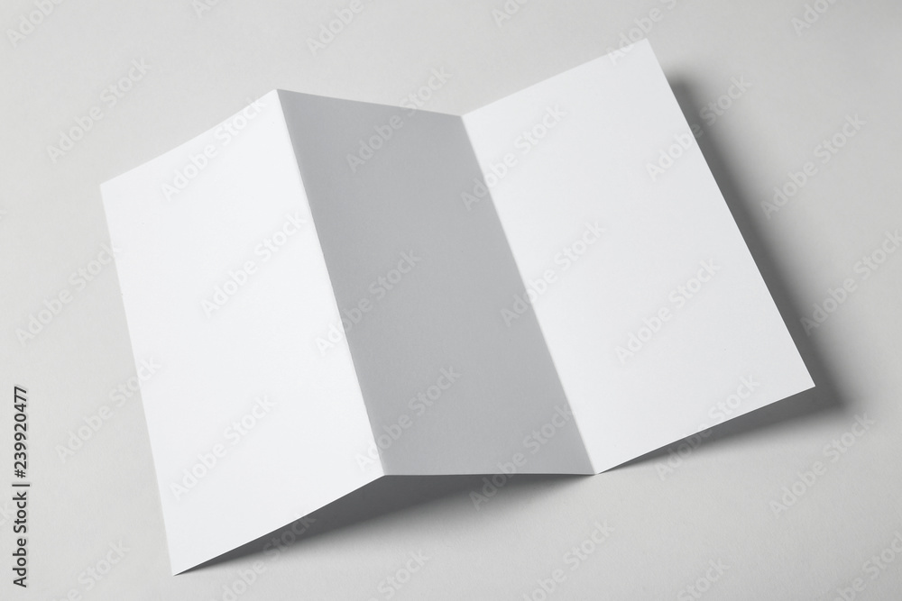 Blank brochure on white background, above view. Mock up for design ...