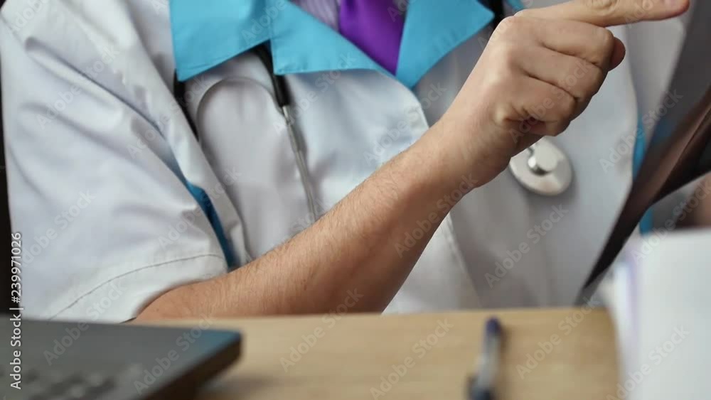 Doctor holding a picture of a brain MRI workflow in diagnostic hospital ...