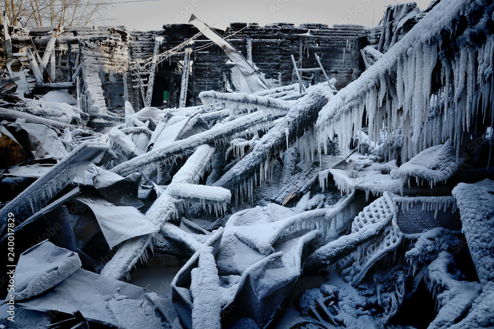 The ruins of a wooden house after a fire in winter Stock Photo | Adobe ...