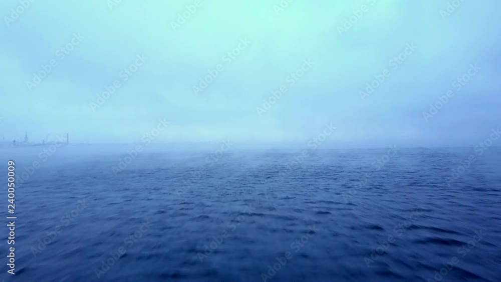 Moving forward sea shot. Misty cold winter sea. Blue ocean background ...