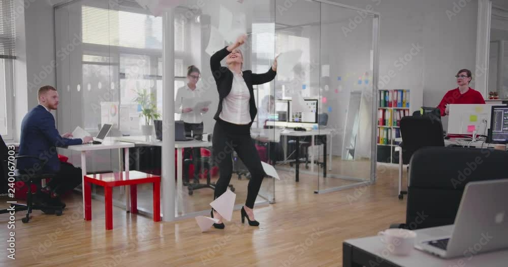 Female boss and her happy colleagues dancing in the office Stock-Video ...